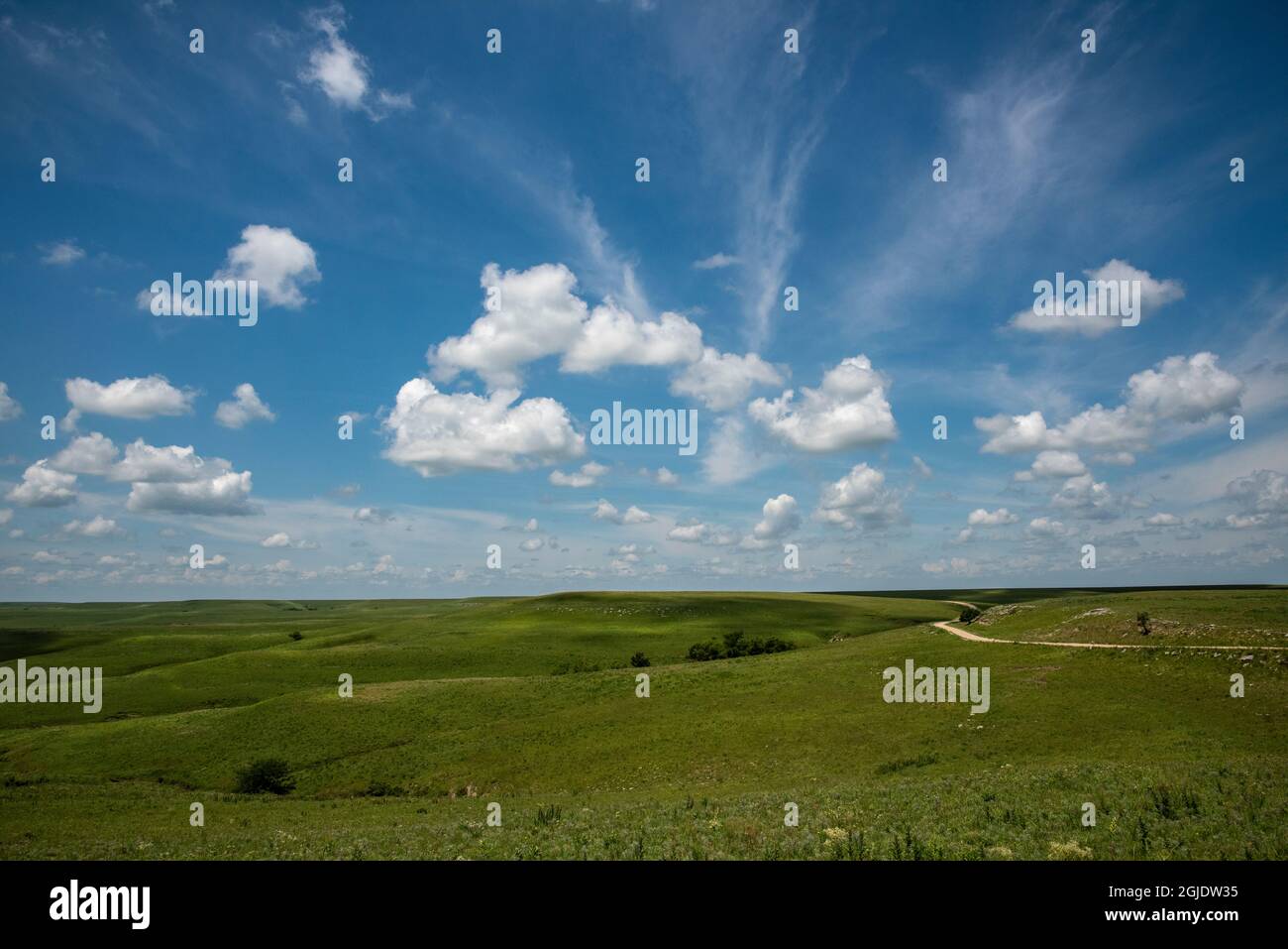 Small road winding through the Flint Hills Stock Photo - Alamy