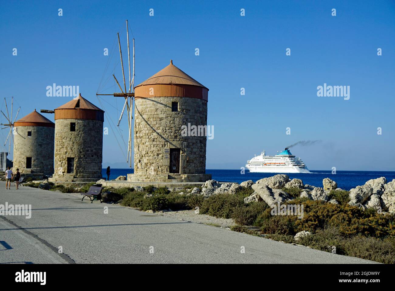 famous windmills at madraki harbor oh rhodes Stock Photo - Alamy