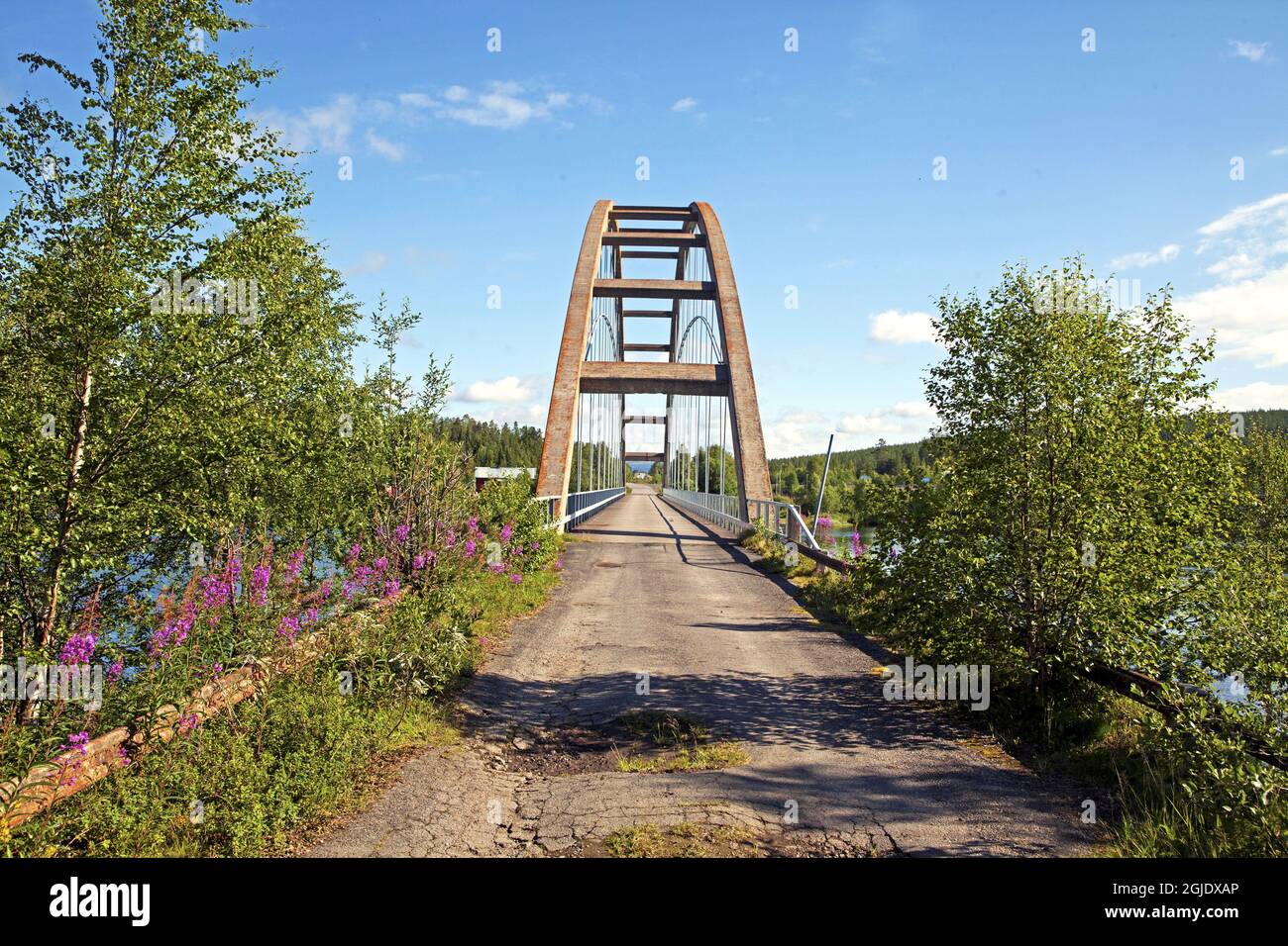 Kalix River and the arch old bridge from the late 1930s at Lappeasuando ...