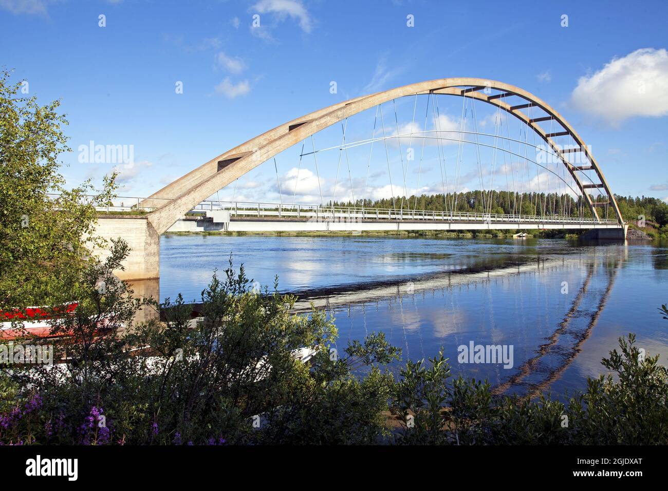 Kalix River and the arch old bridge from the late 1930s at Lappeasuando ...