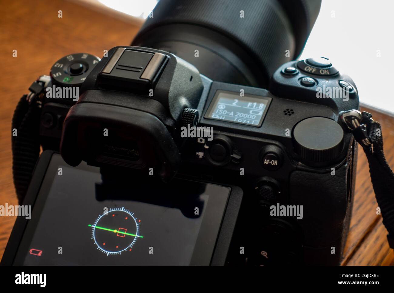 Selective focus on low battery display of a high end camera before ...