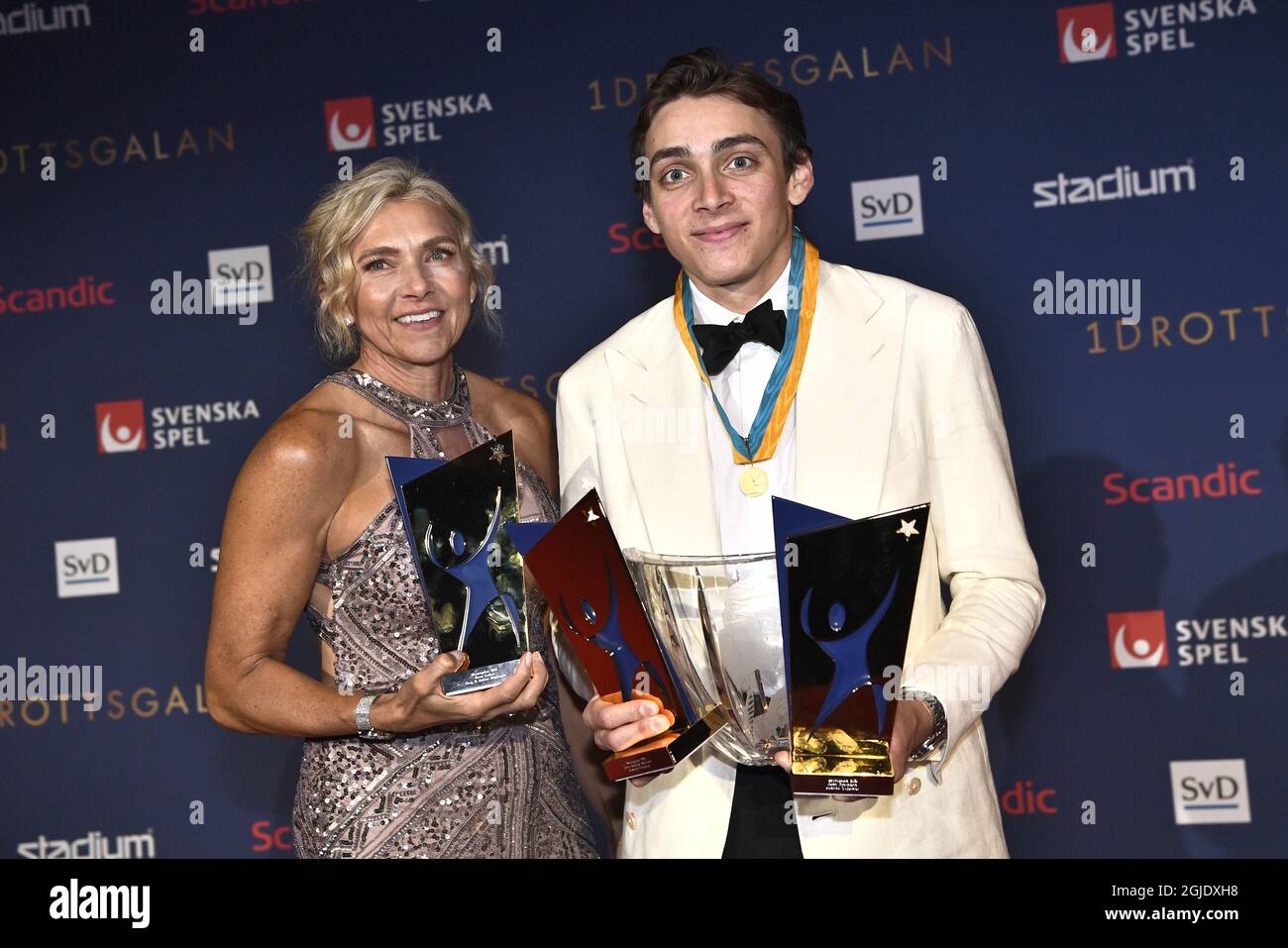Swedish-American pole vaulter Armand Duplantis and his coach, mother ...