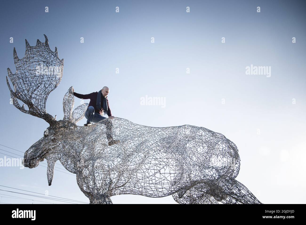 The Syrian-born artist Mohannad Soleman is putting the finishing ...
