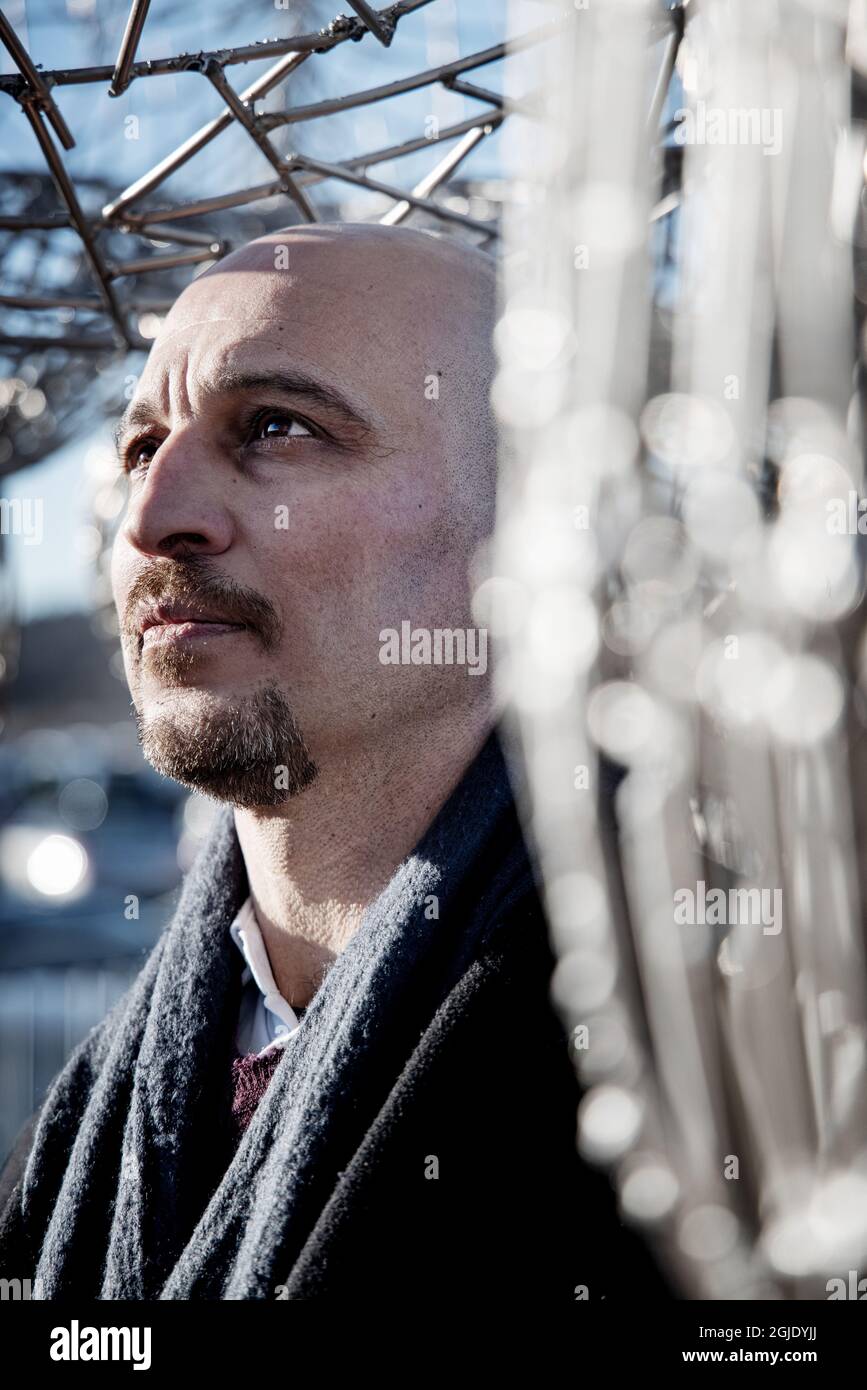 The Syrian-born artist Mohannad Soleman is putting the finishing ...