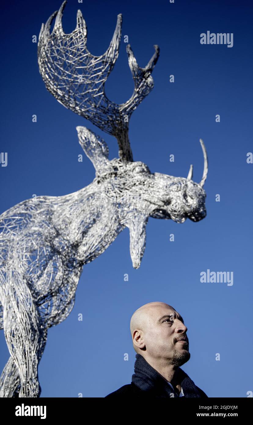 The Syrian-born artist Mohannad Soleman is putting the finishing ...