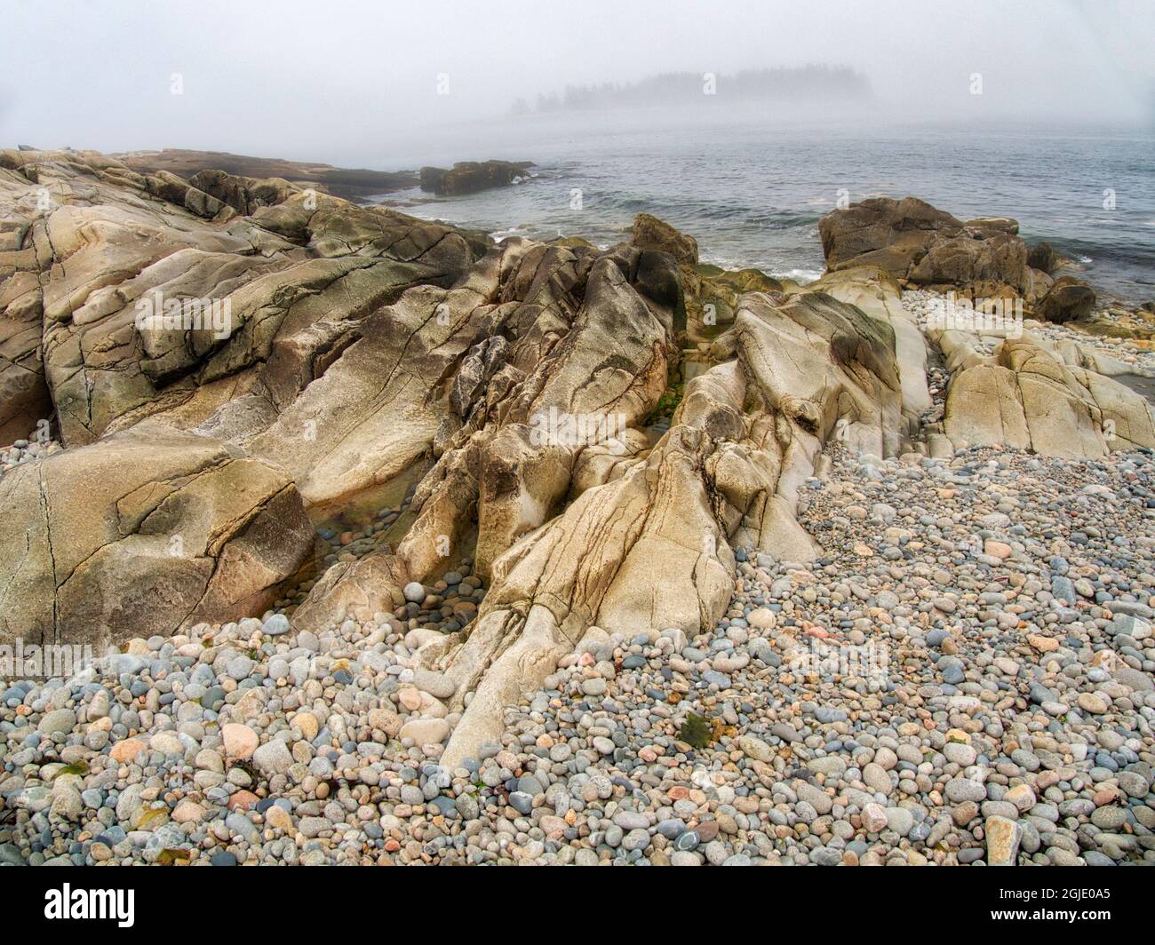 USA, Maine. Rocky shoreline at Schoodic Point in Acadia National Park ...