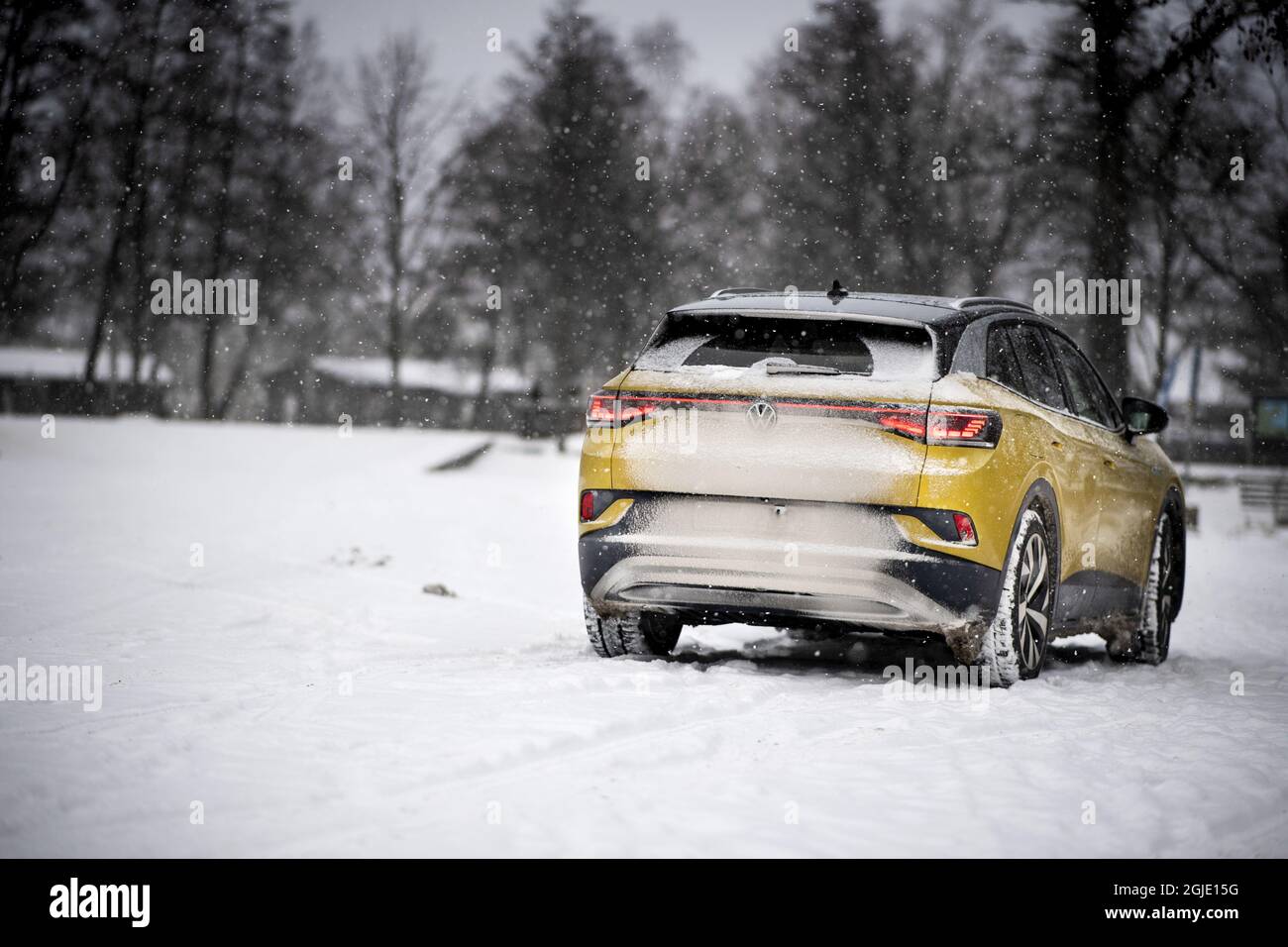 Volkswagen ID.4 1st Edition Max electric SUV. Car driving on a snowy ...