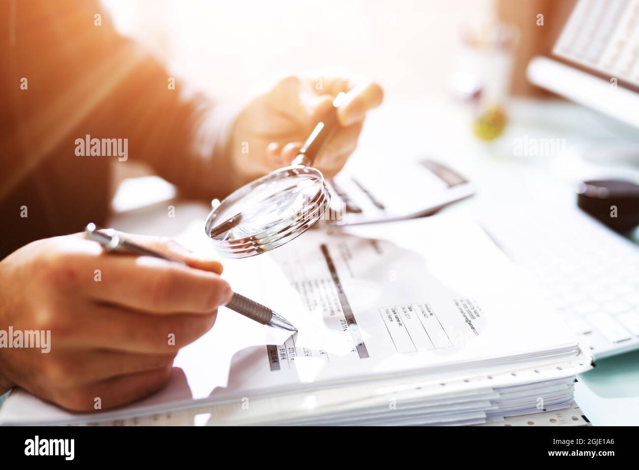 Businessman using magnifying glass hi-res stock photography and images ...