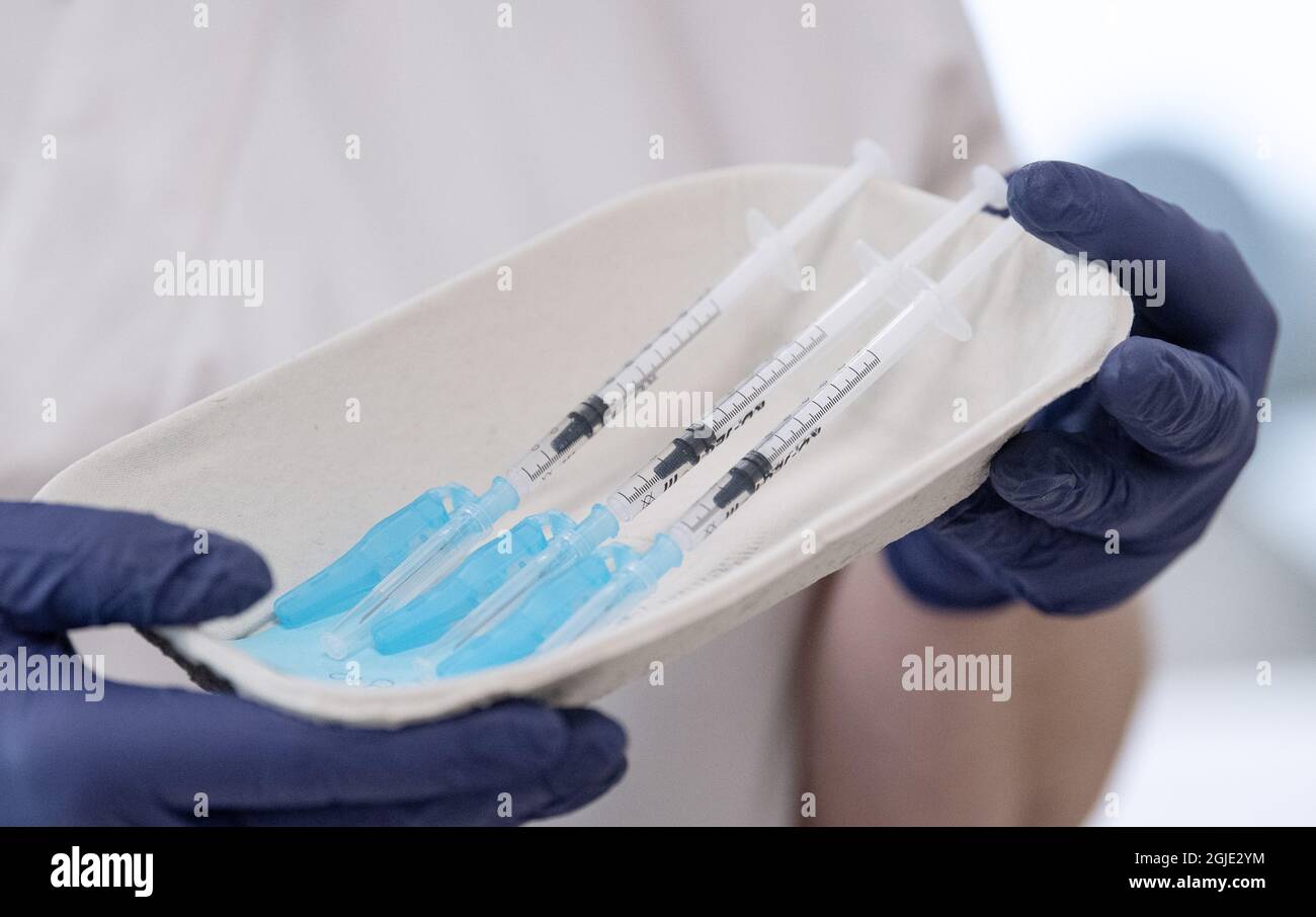 Syringes filled with Comirnaty Covid-19 vaccine made by Pfizer ...
