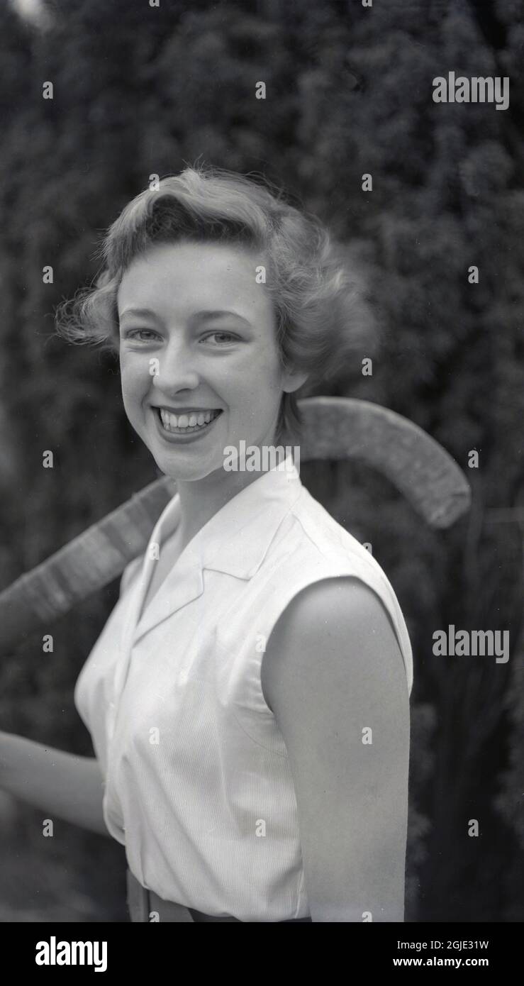 1950s smiling woman in white hi-res stock photography and images - Alamy