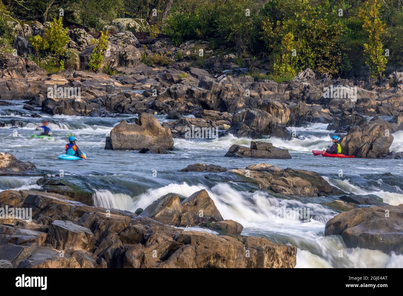USA, Maryland, Great Falls, Potomac River, kayakers maneuvering the ...