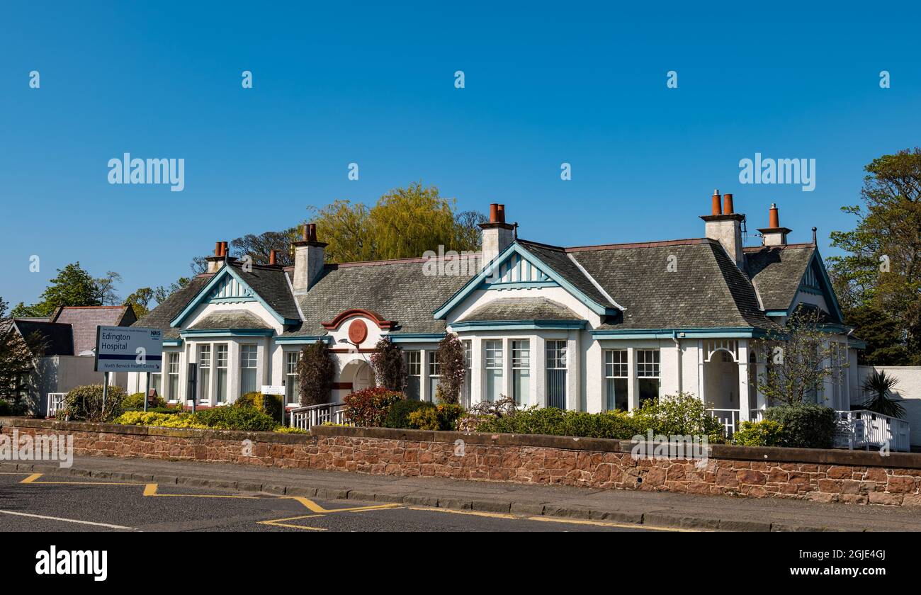 1910 built Edington Cottage Hospital with a sunny blue sky, North ...