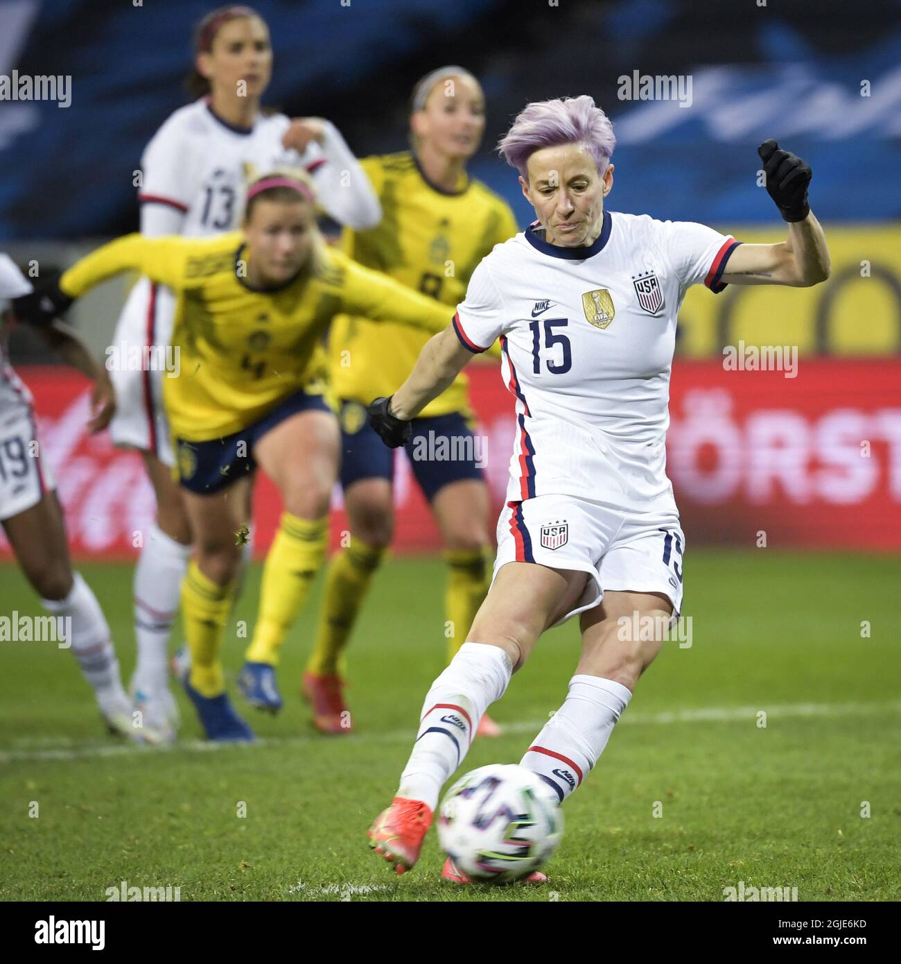 Megan Rapinoe of USA scores a penalty during a friendly international ...