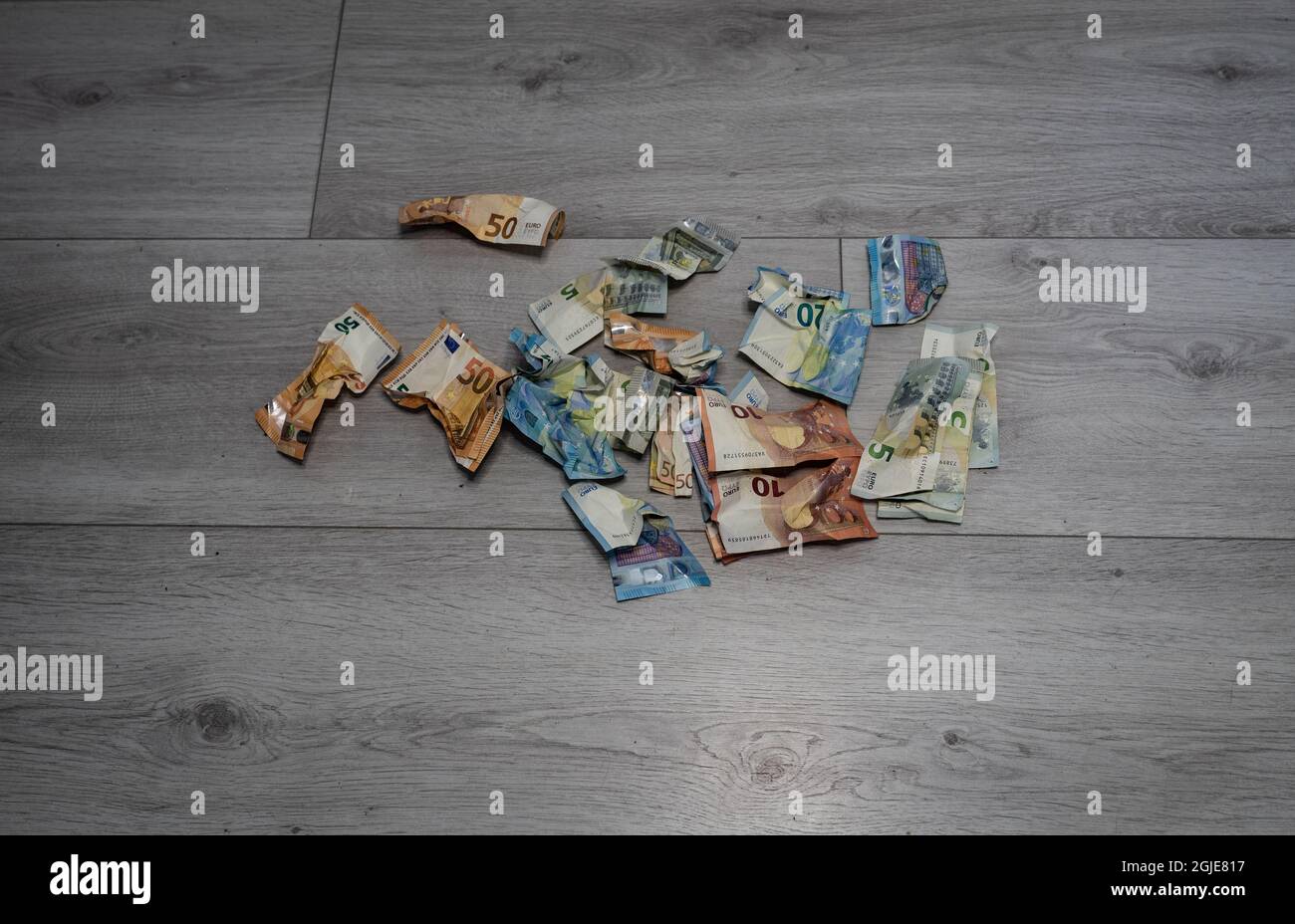 Euro banknotes on the floor Stock Photo - Alamy