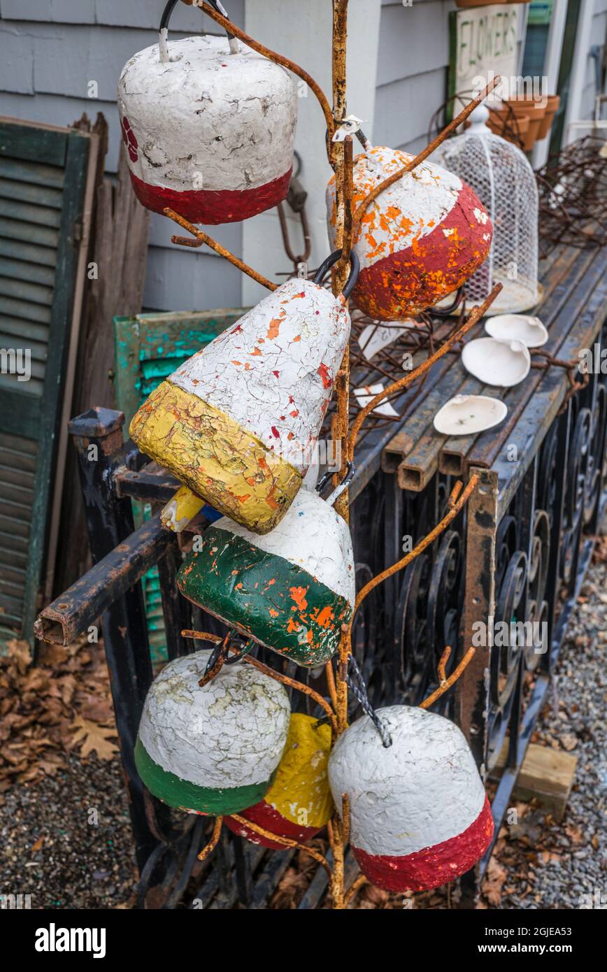 USA, Massachusetts, Cape Ann, Essex. Antique lobster buoys Stock Photo ...
