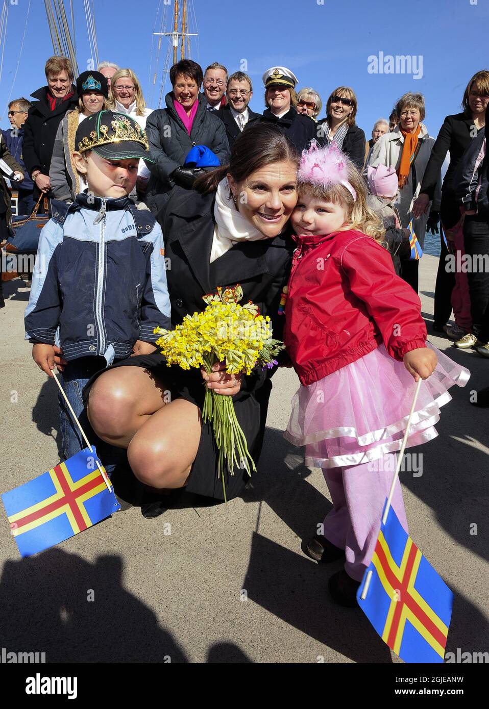 Crown Princess Victoria, center, of Sweden hugs the Aland born children ...