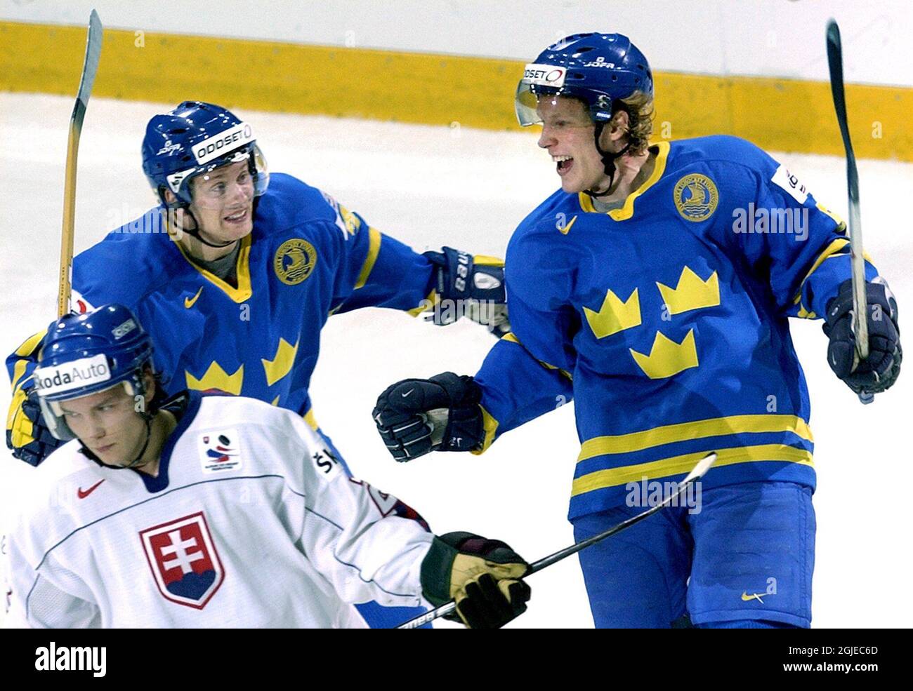 Sweden's Johan Davidsson (l) congratulates teammate Mika Hannula (r) on ...