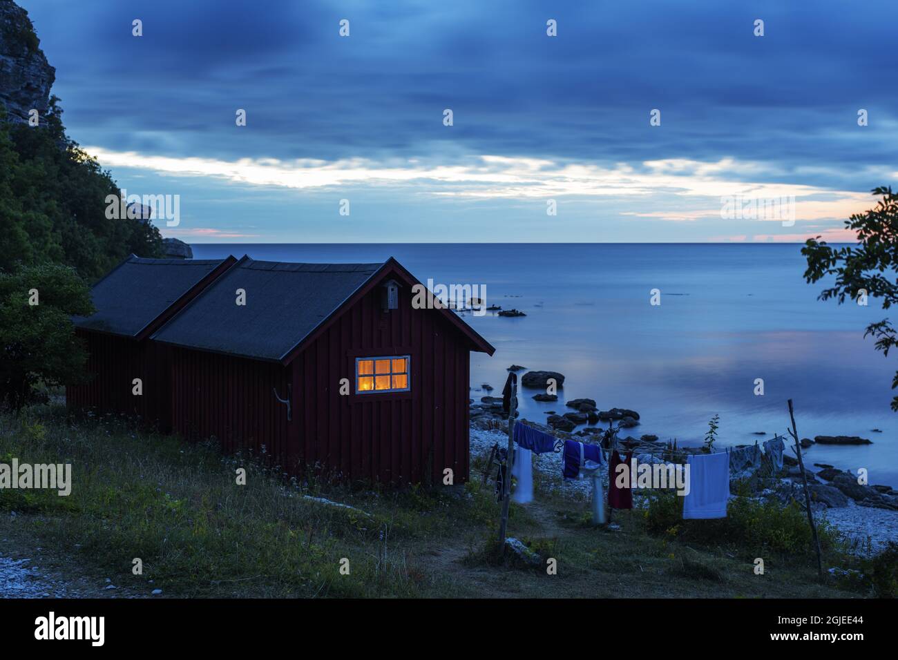 A house, building, in thedusk at Hien, Stora Karlso, Eksta, Gotland ...