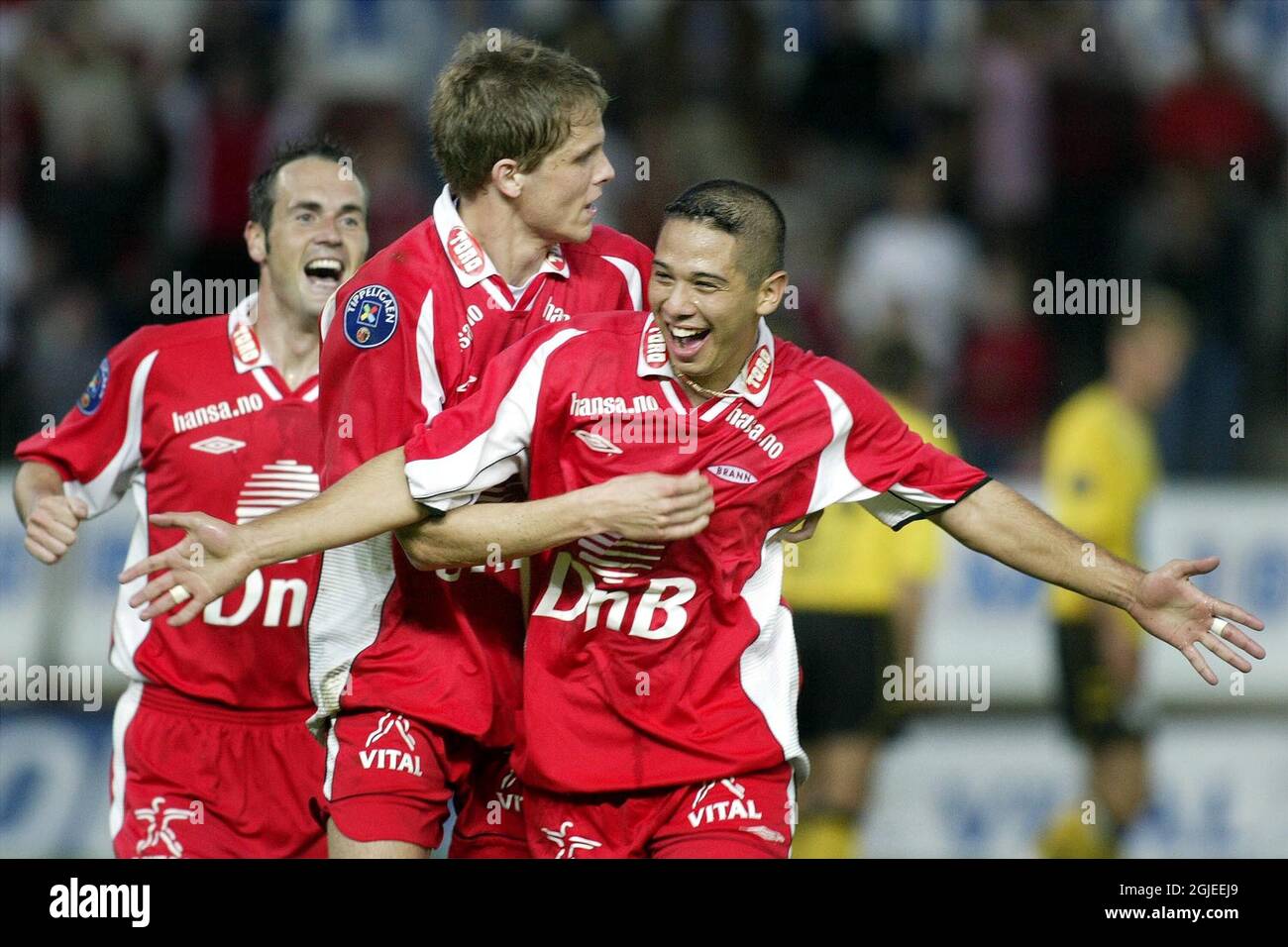 Robbie Winters (l) celebrates with his SK Brann team mates Stock Photo ...