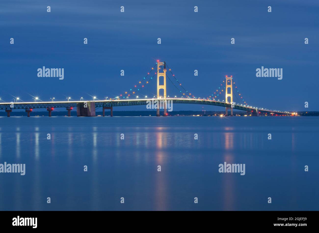 Mackinac Bridge lit up at twilight, seen from Saint Ignace, Upper ...