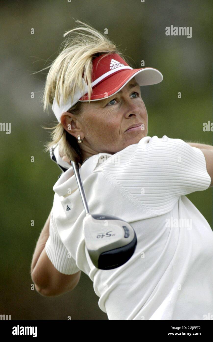 Swedens' Liselotte Neumann watches her tee-shot travel down the fairway ...