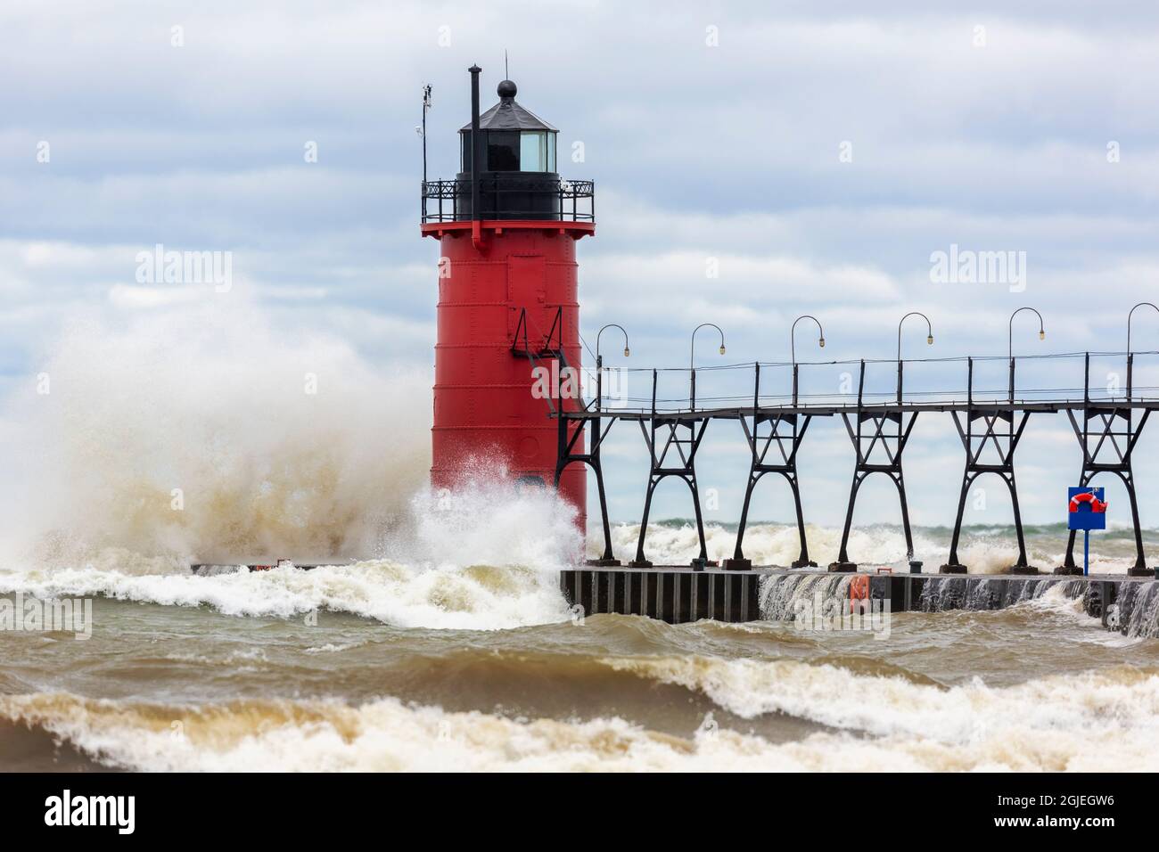 South Haven Lighthouse with high waves crashing, South Haven, Michigan Stock Photo - Alamy