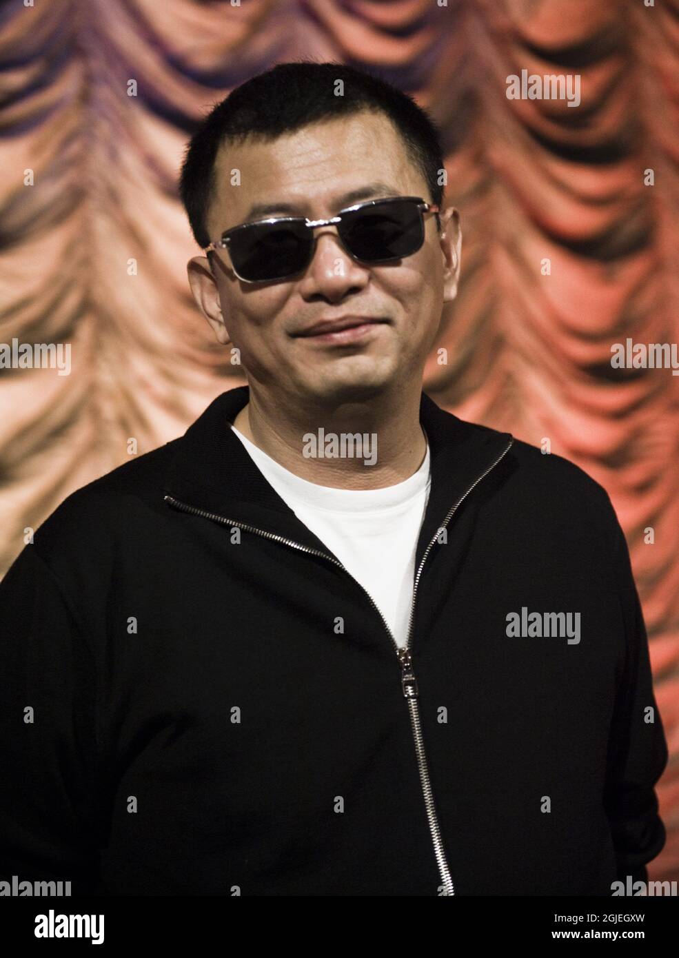 Chinese film director Wong Kar-Wai speaks during a photocall at ...