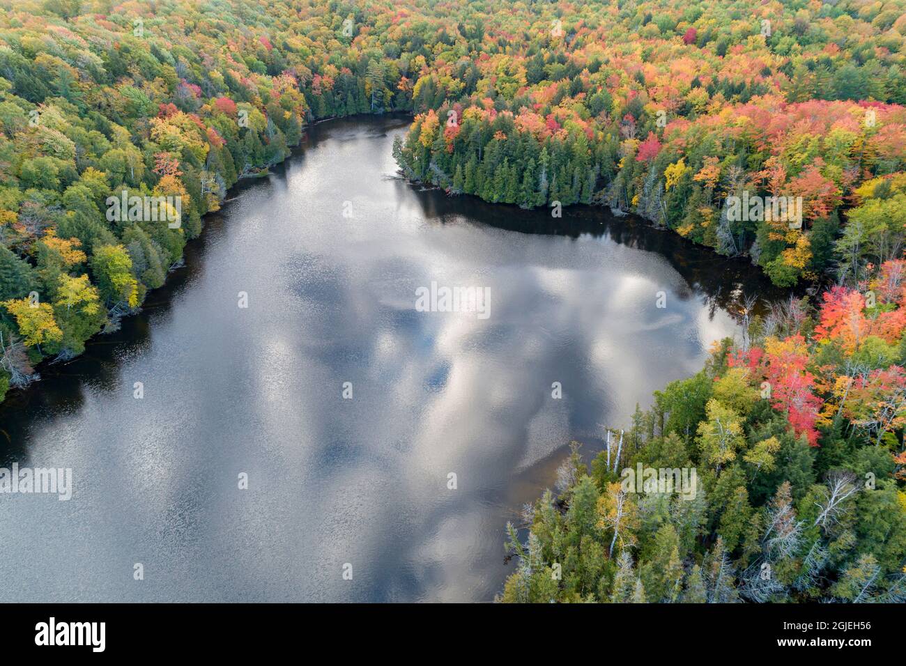 Aerial view of Hugoboom Lake in fall color, Alger County, Michigan ...