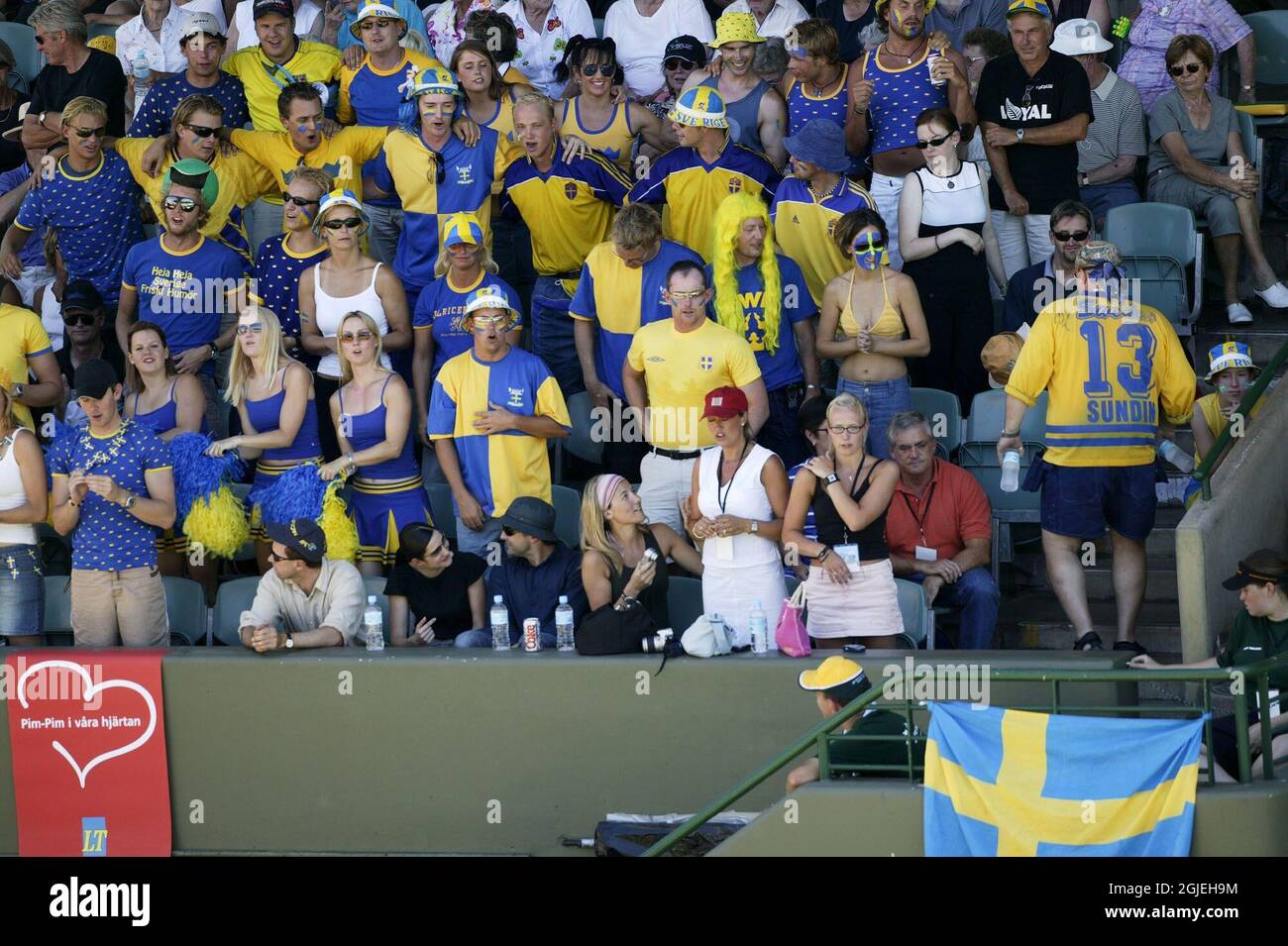 Swedish fans wearing yellow and blue sense a shock victory Stock Photo ...