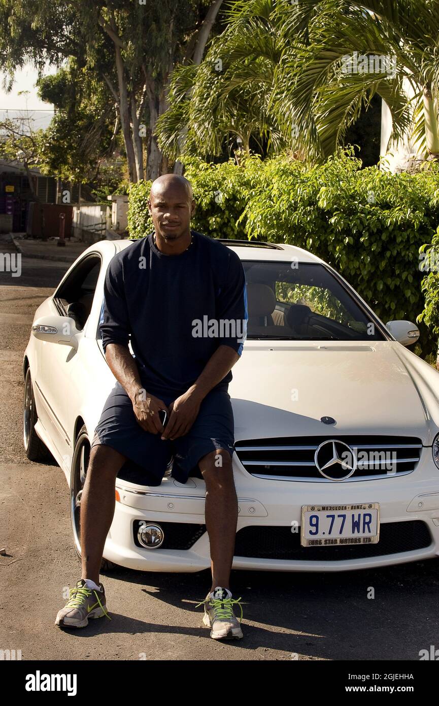 Sprinter Asafa Powell is seen during pre season training at the ...