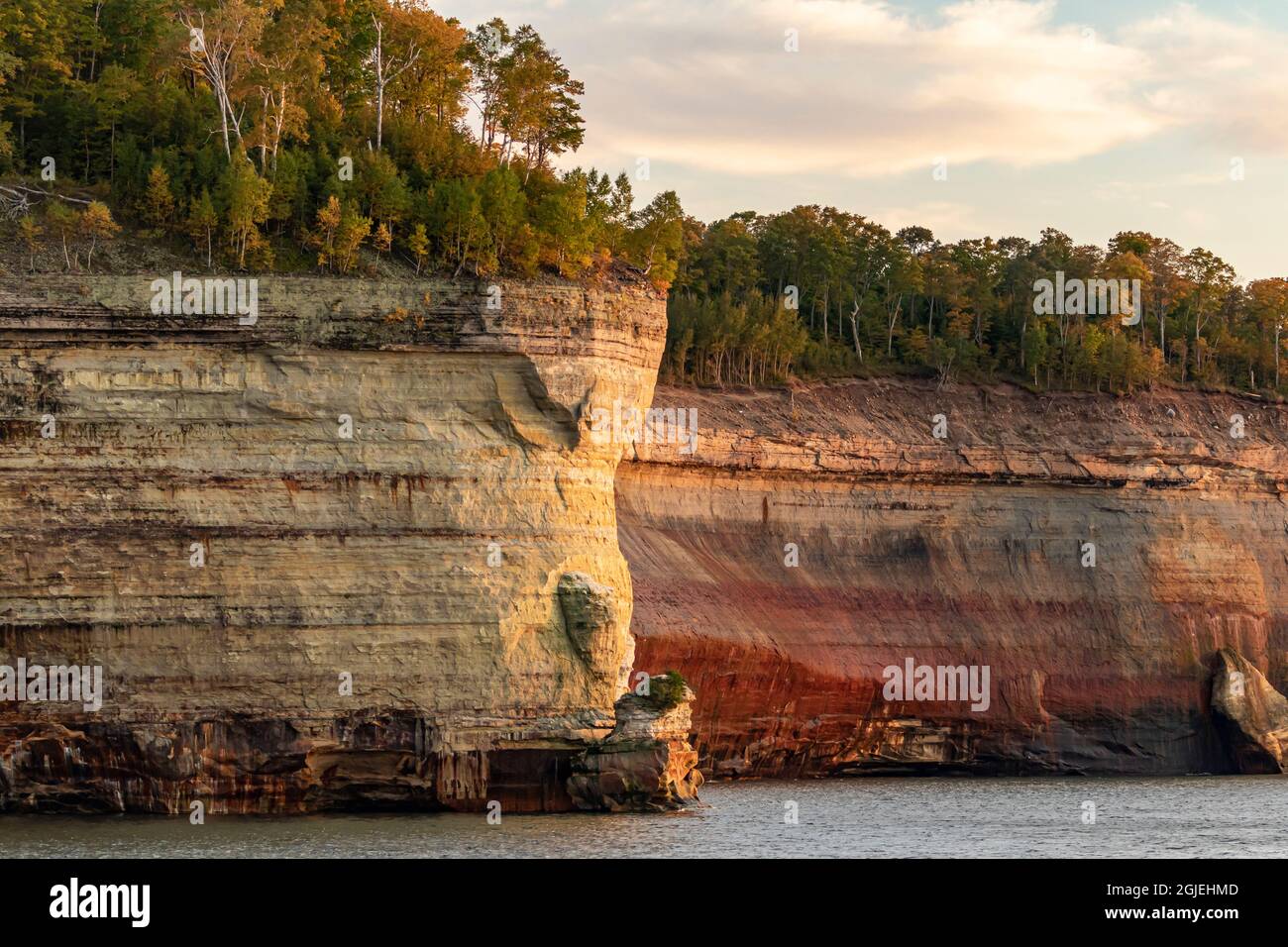 Michigan, Upper Peninsula, Lake Superior. Mineral-stained cliffs at ...