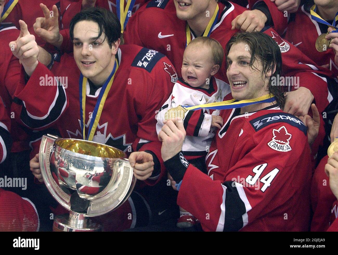Canada's Ryan Smyth (r) with his son (crying) celebrate with the trophy ...