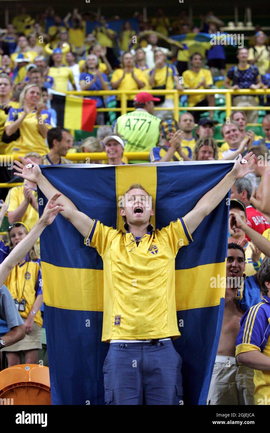 A Sweden fan cheers on his team Stock Photo - Alamy