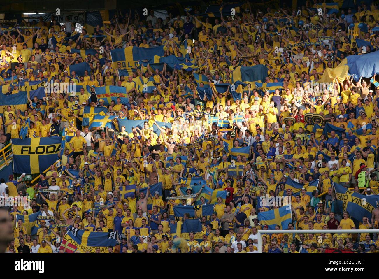 Sweden fans cheer their team to victory Stock Photo - Alamy