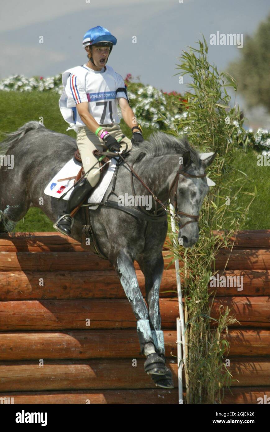 France's Nicolas Touzaint in action onboard Galan De Sauvagere Stock ...
