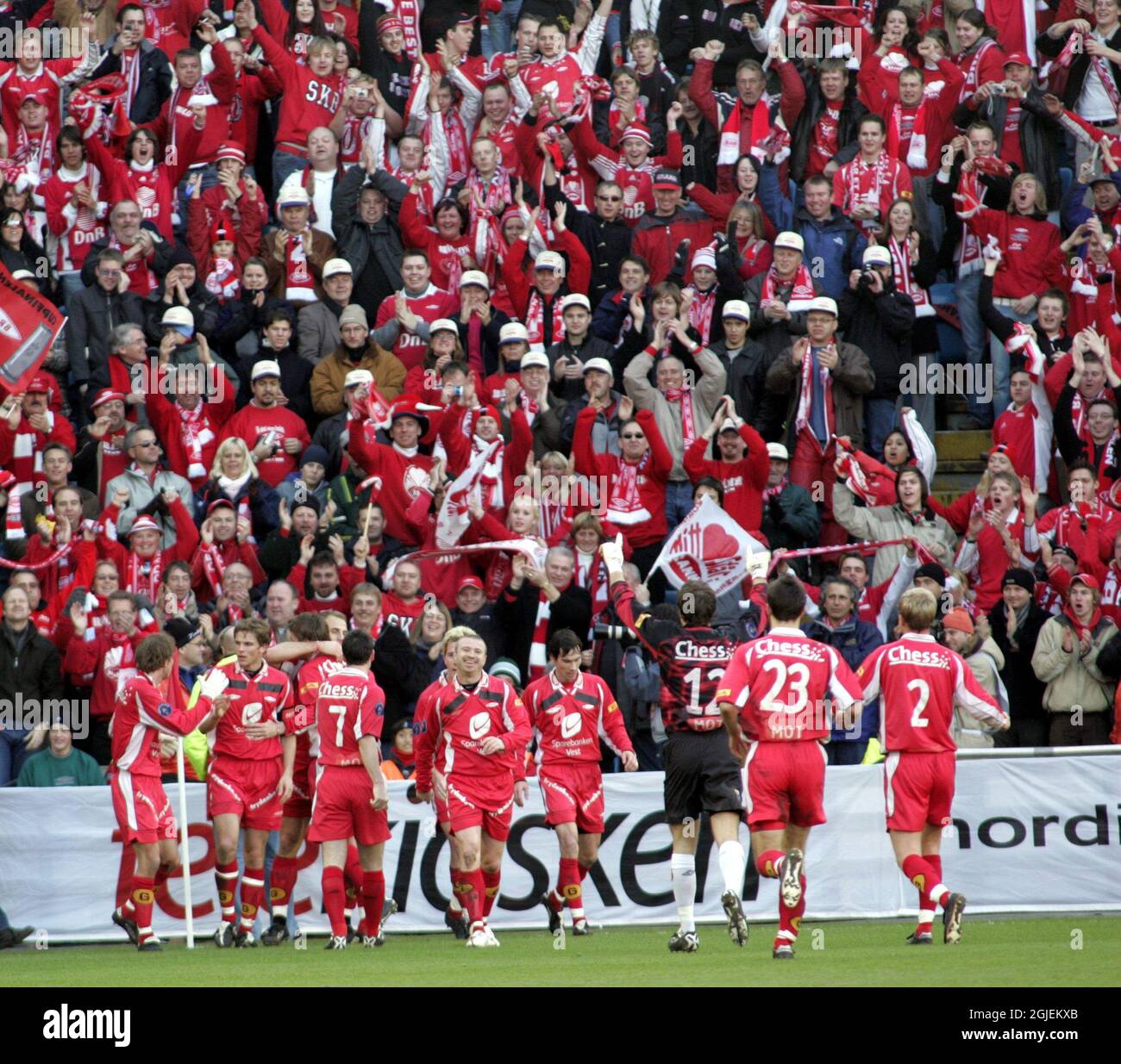The SK Brann players celebrate winning the cup infront of their ...