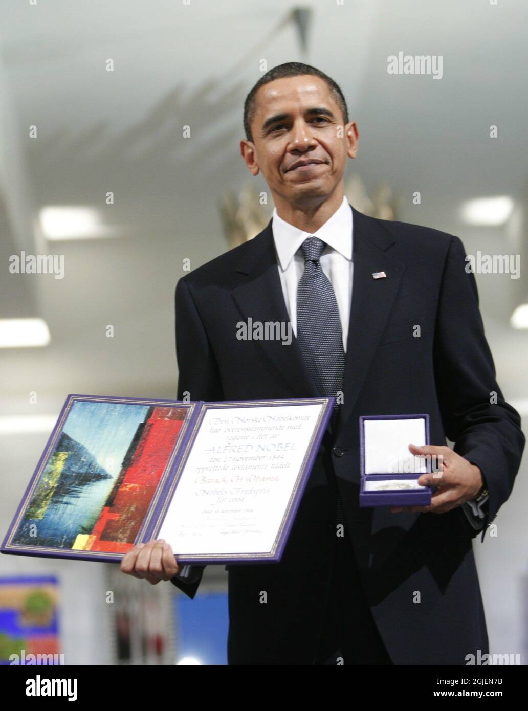 Nobel Peace laureate, US President Barack Obama, with his Nobel medal ...