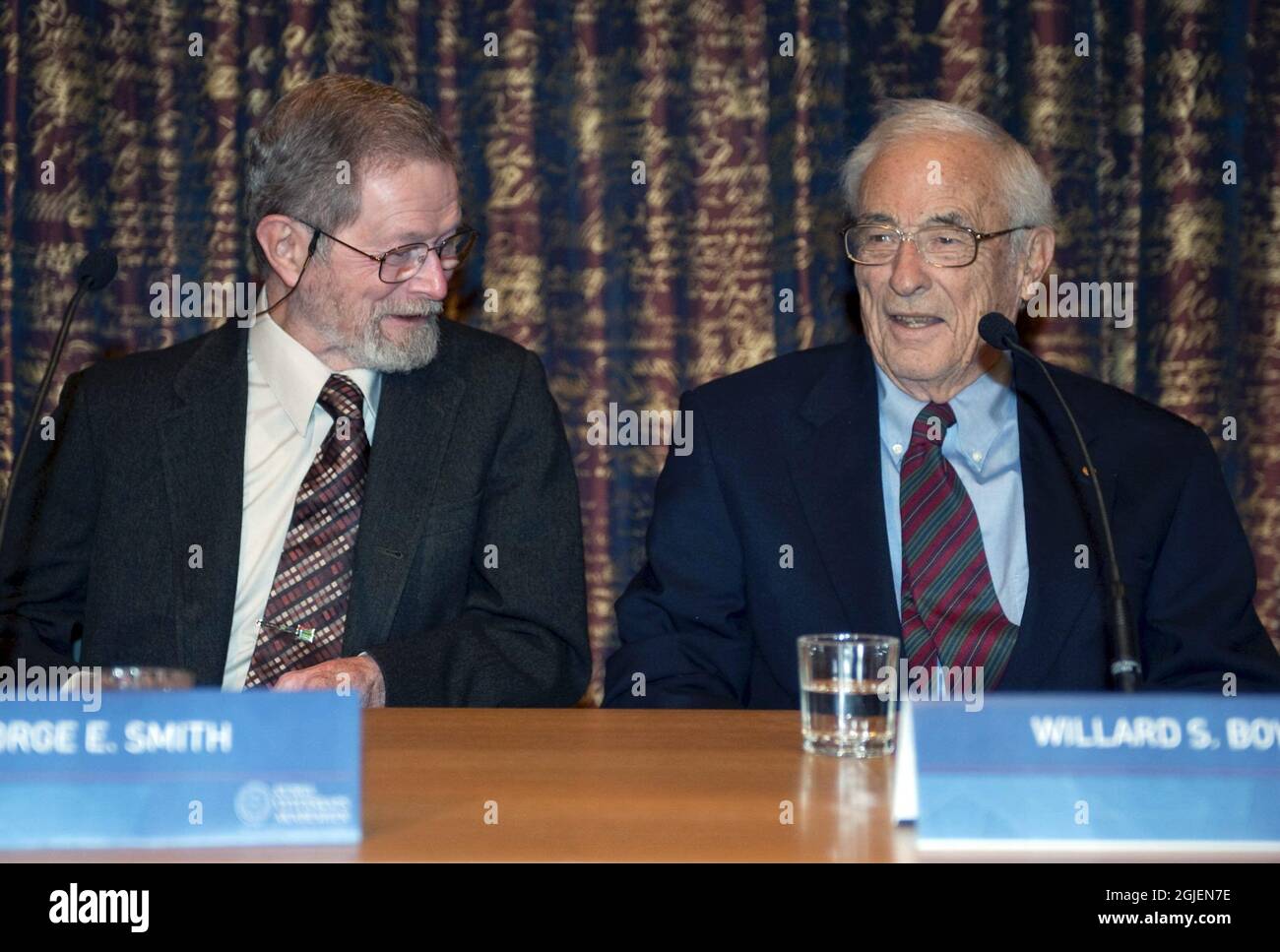 Physics laureates George E. Smith and Willard S. Boyle during the Nobel ...