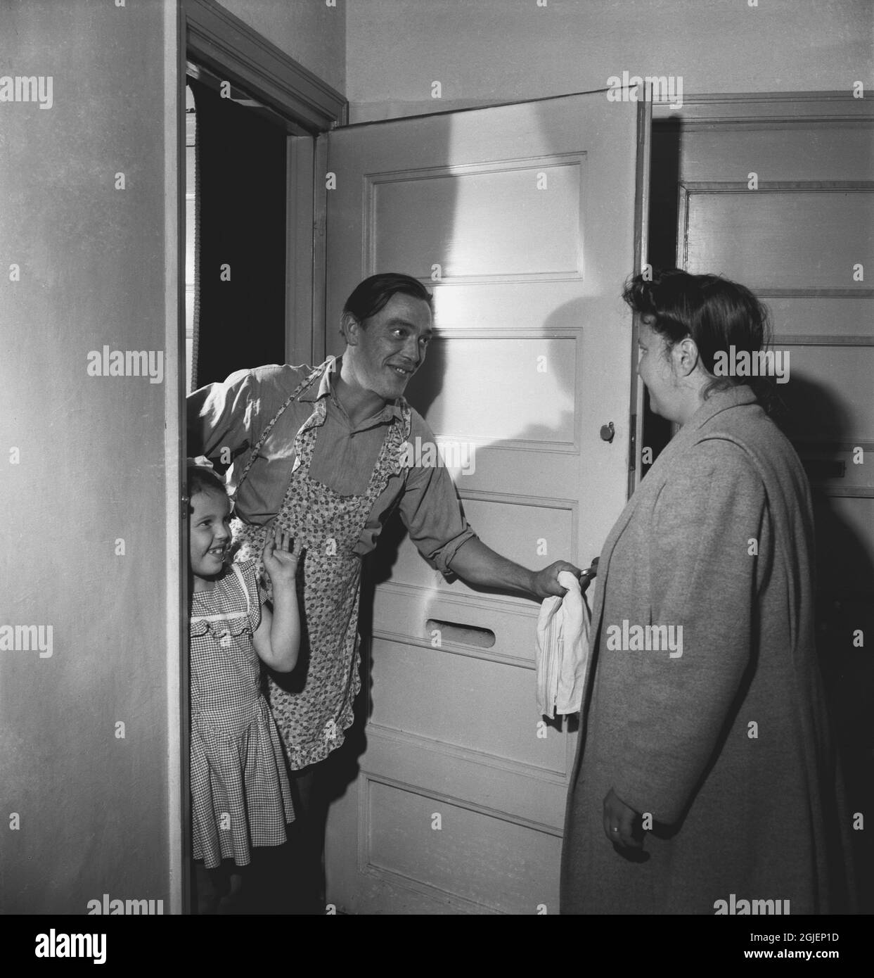 The wife is welcomed home by her husband after a day of reversing the ...