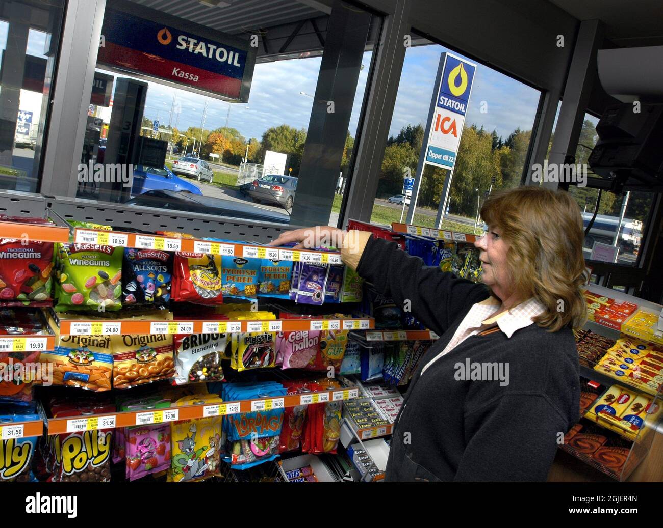 The shelves with sweets at a Statoil petrol station Stock Photo - Alamy