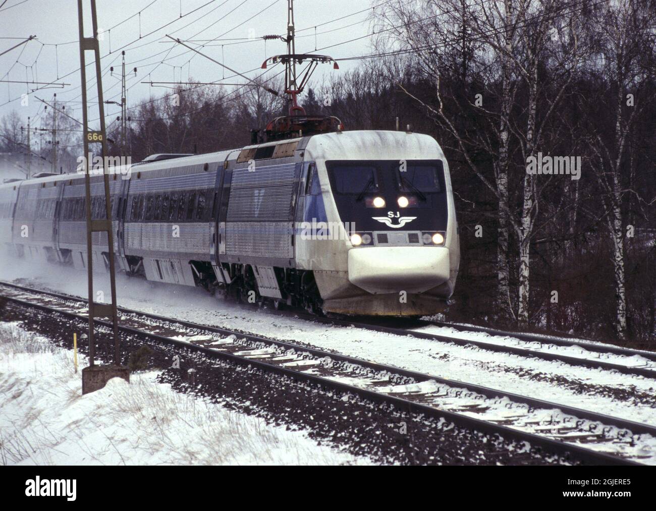 A X2000 high-speed train in winter landscape Stock Photo - Alamy