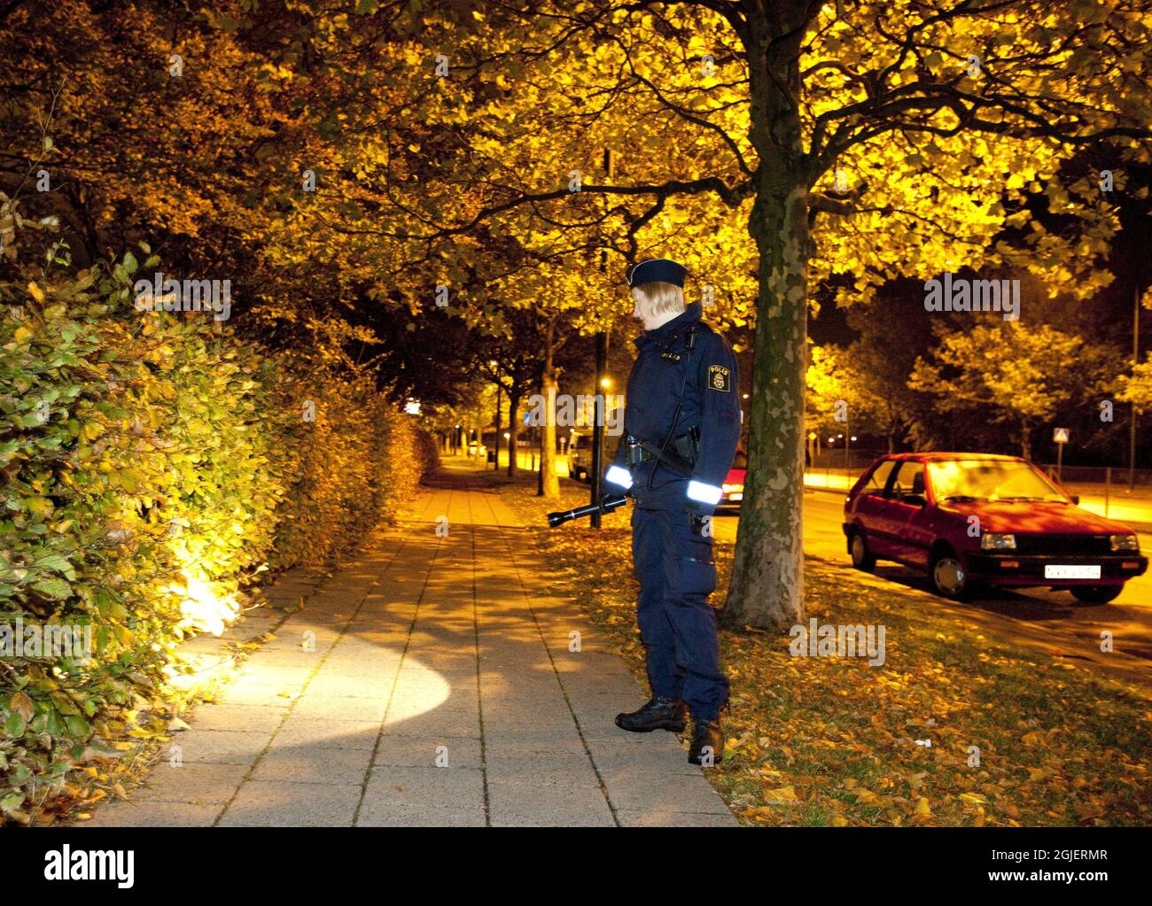 A police officer investigates a crime scene in Malmo, Sweden. Police in ...