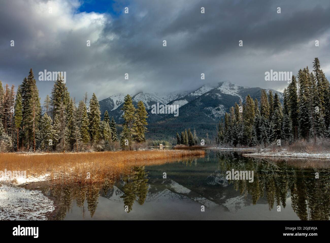 Early winter snow along Holland Lake in the Flathead National Forest ...