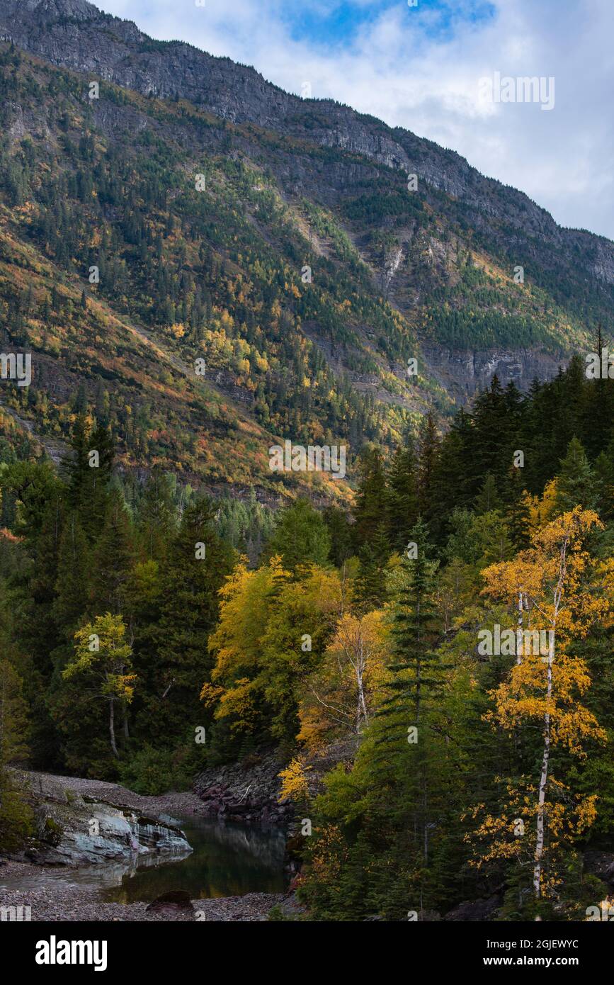 USA, Montana. Rocky outcrop, McDonald Creek, Glacier National Park ...