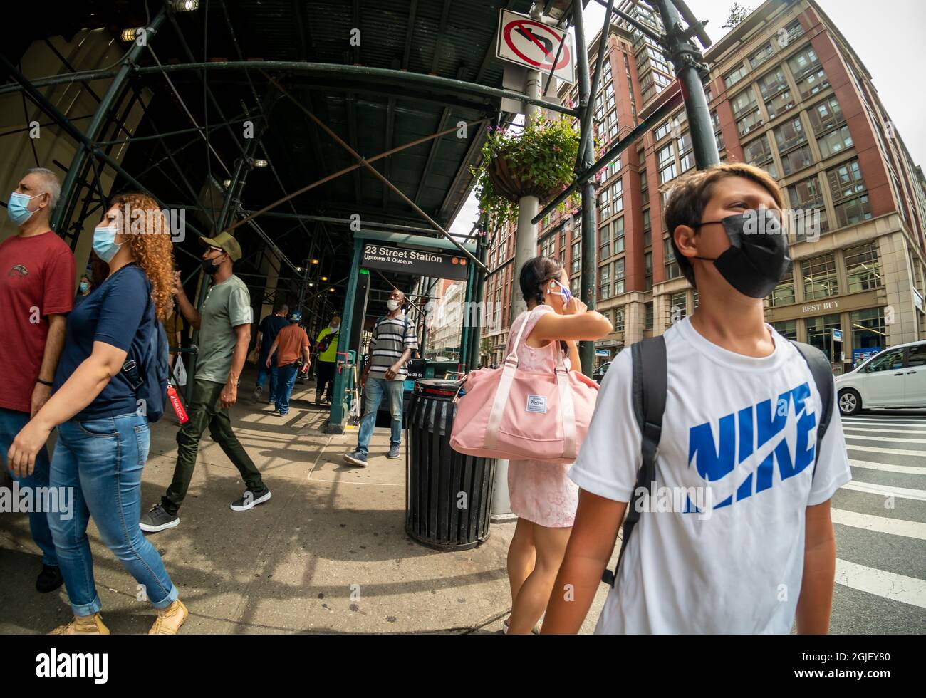 People exit the subway in the Chelsea neighborhood of New York on ...