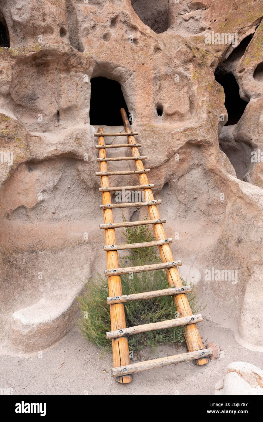 USA, New Mexico. Bandelier National Monument, Ladder leads to entrance ...