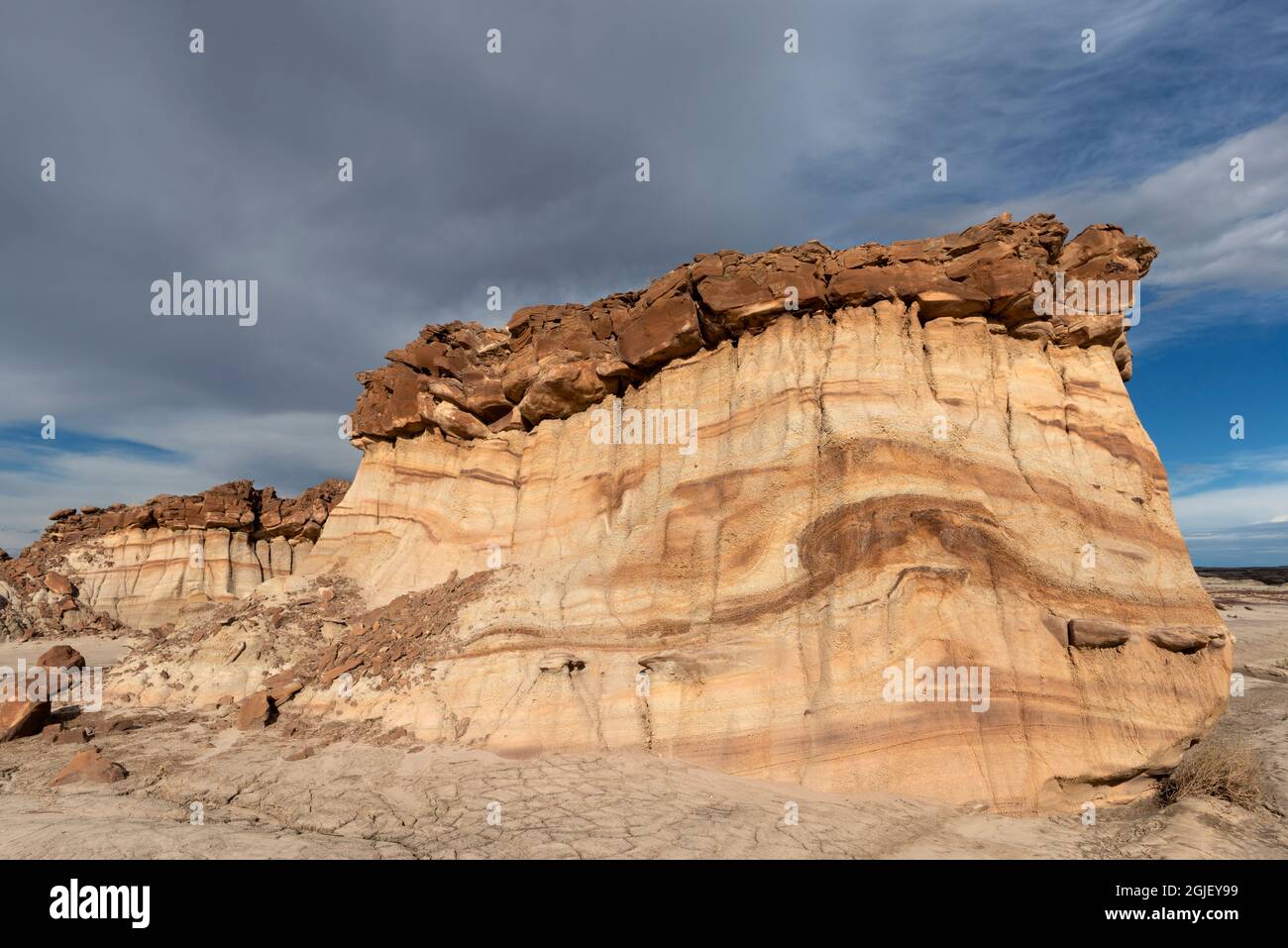 USA, New Mexico. Bisti/De-Na-Zin Wilderness. Layered, sedimentary ...