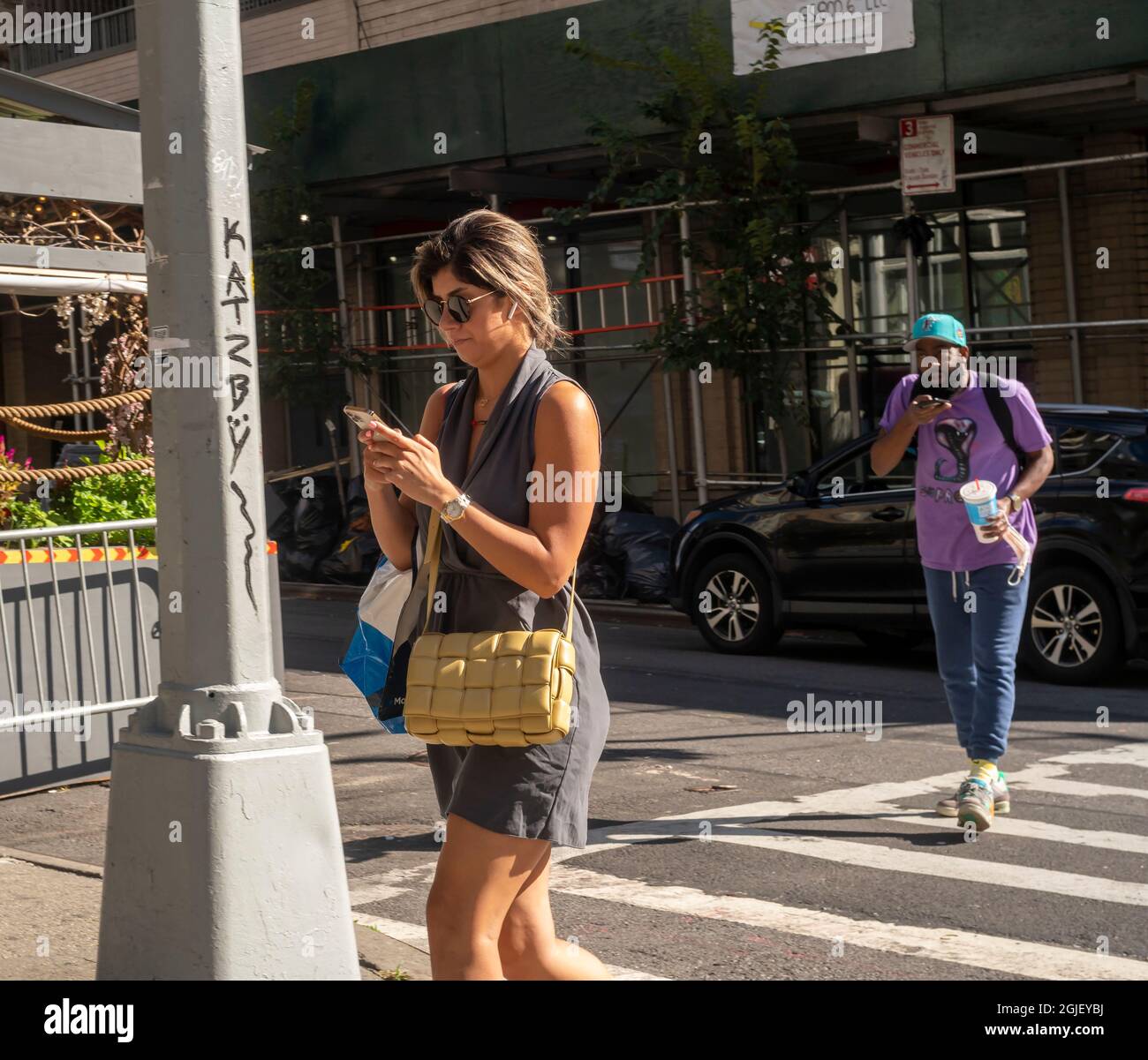 Distracted woman in Midtown Manhattan in New York on Thursday ...