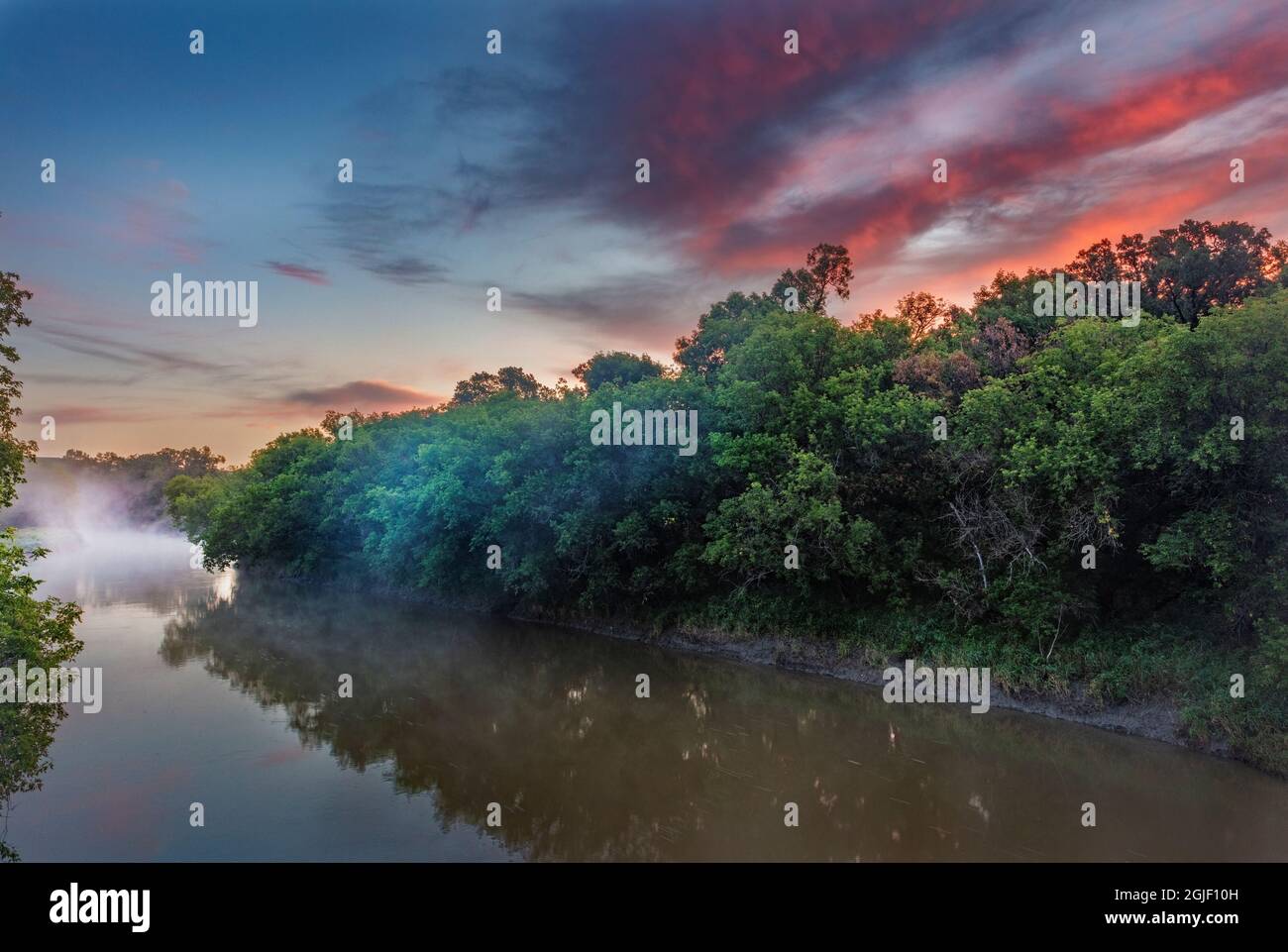 Sunrise sky over the Sheyenne River at Fort Ransom State Park, North ...
