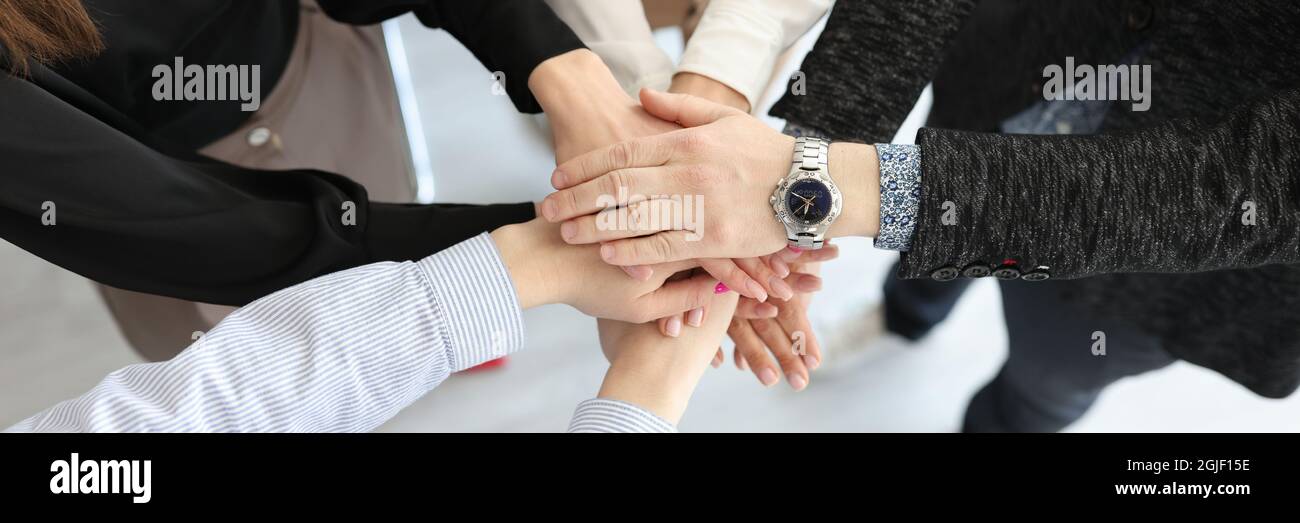 Group of business people folding many hands together closeup Stock ...